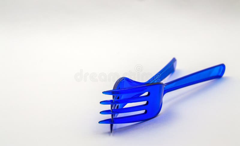 Blue Plastic Fork on White Background Close-up Stock Image - Image of ...
