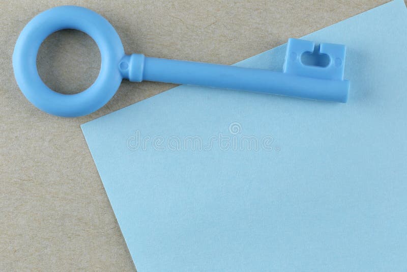 Blue Plastic Key is Placed on Blue Paper Note. Stock Image - Image of ...