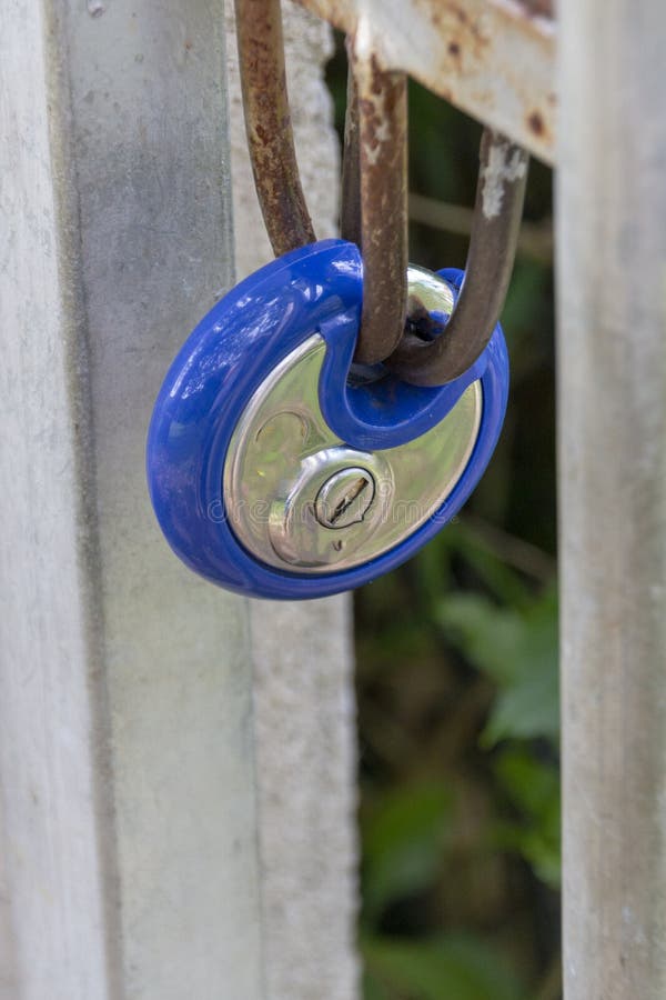 A blue plastic lock stock photo. Image of daylight, protect - 136940870