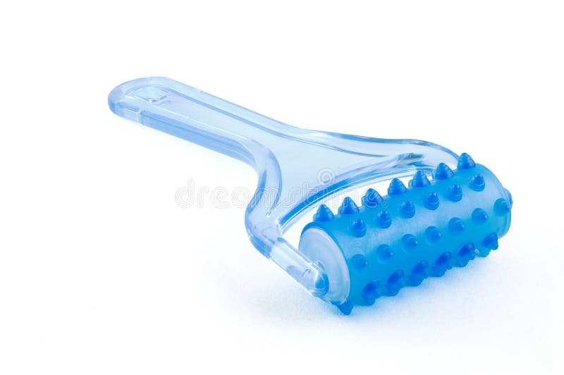 Blue Plastic Massager on Isolated White Background. Close-up. Full ...