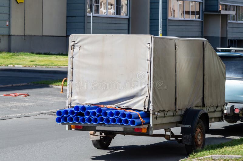 Blue Plastic Pipe in Covered Trailer Stock Image - Image of engineering ...