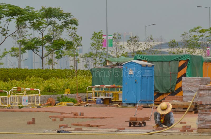 A Blue Plastic Portable Toilet Stalls in the Park Editorial Stock Image ...