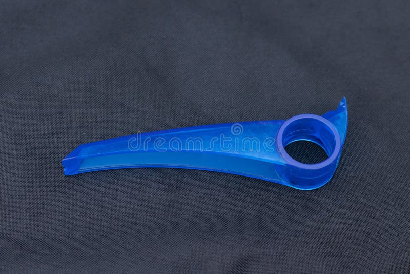 Plastic Ring-pull Tool for Opening Tins Stock Photo - Image of gadget ...