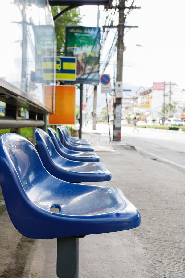 Blue Plastic Seats in Bus Stop, Soft Focus Stock Photo - Image of bench ...