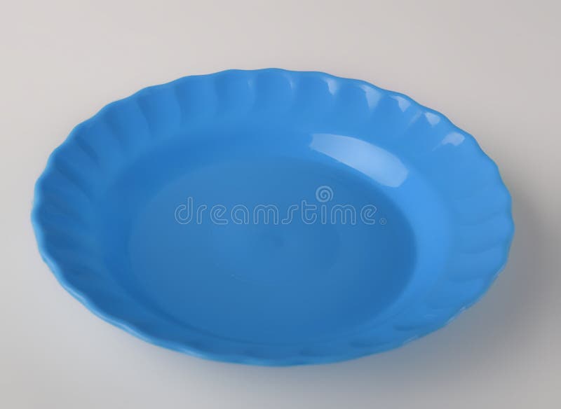 Blue plastic shallow dish stock photo. Image of studio - 86486760