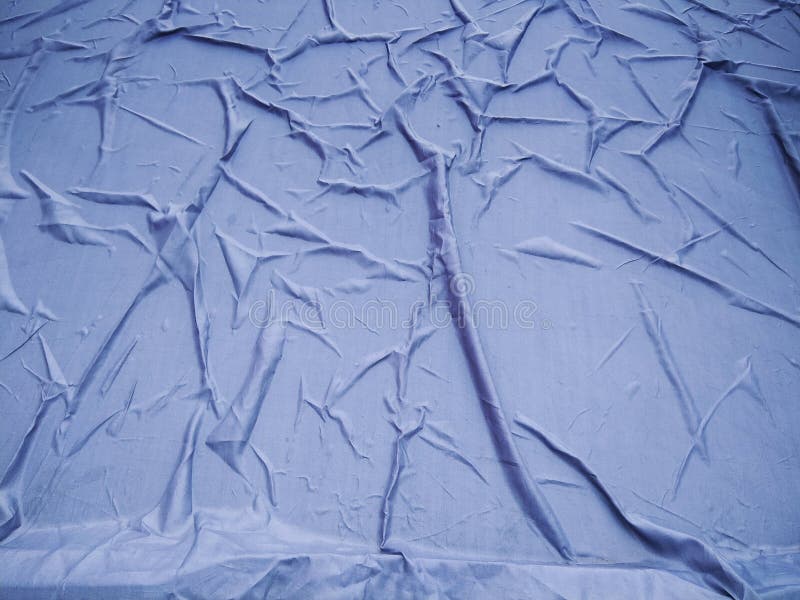 The Blue Plastic Sheet on the Car for Dust and Rain Protection. Stock ...