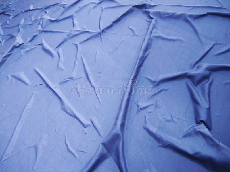 The Blue Plastic Sheet on the Car for Dust and Rain Protection. Stock ...