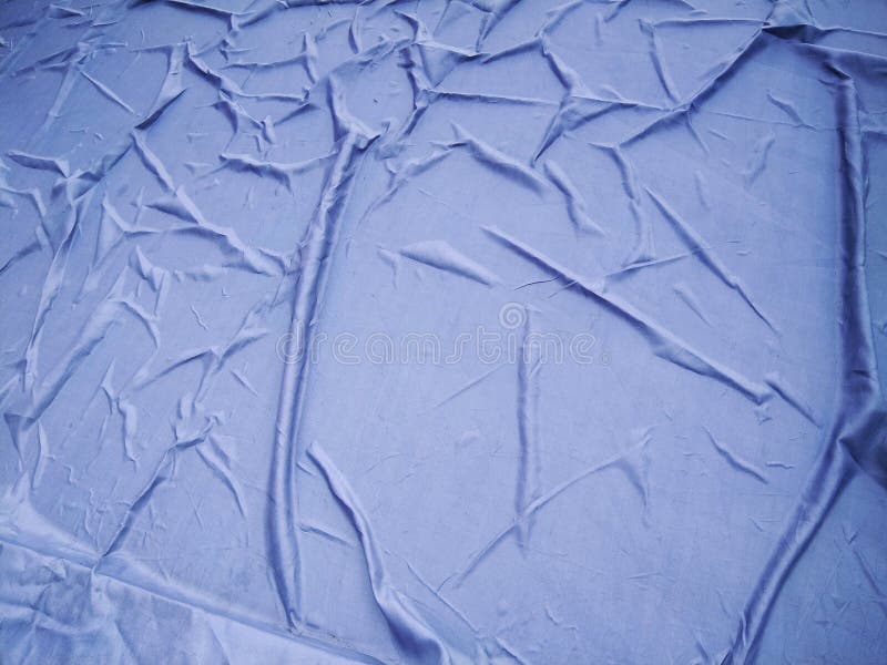 The Blue Plastic Sheet on the Car for Dust and Rain Protection. Stock ...