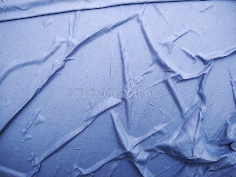 The Blue Plastic Sheet on the Car for Dust and Rain Protection. Stock ...