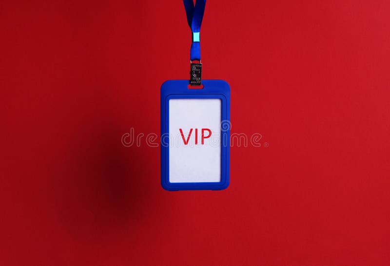 Blue Plastic Vip Badge Hanging on Red Background Stock Image - Image of ...