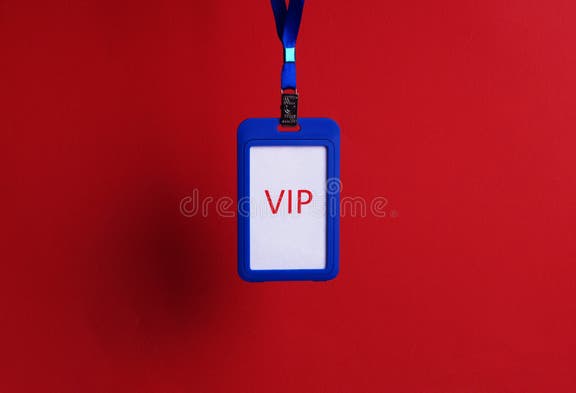Blue Plastic Vip Badge Hanging on Red Background Stock Image - Image of ...