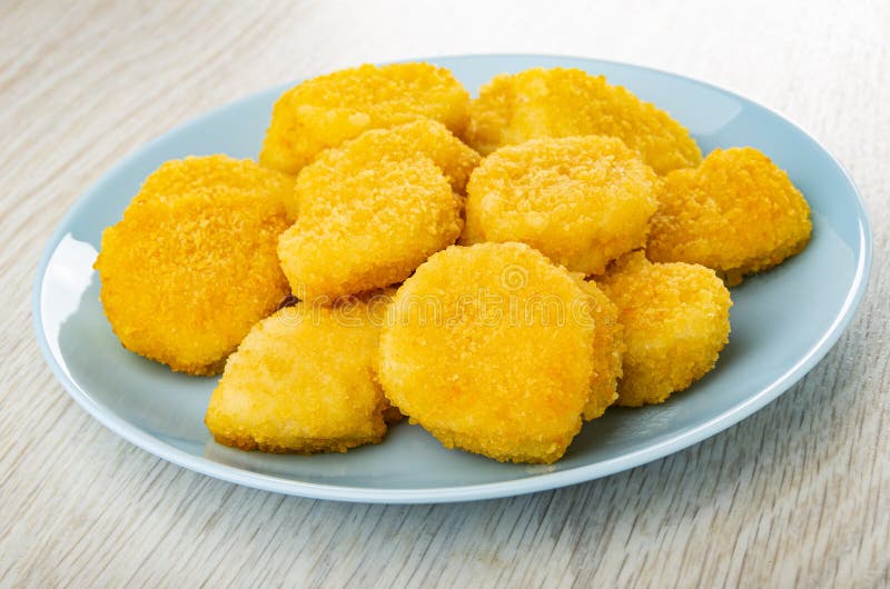 Blue Plate with Chicken Nuggets on Wooden Table Stock Image - Image of ...