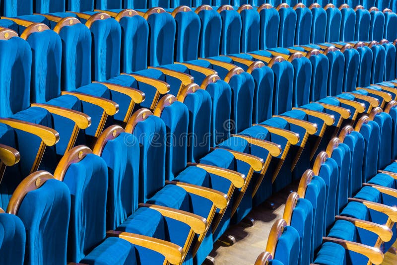 Blue Plush Chairs with Wooden Armrests in the Auditorium. Empty ...