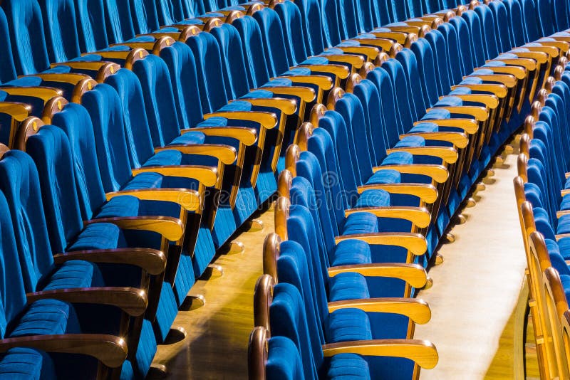 Blue Plush Chairs with Wooden Armrests in the Auditorium. Empty ...