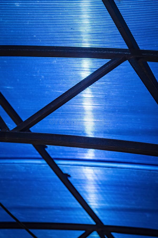 Blue polycarbonate canopy stock photo. Image of fastening - 225977764