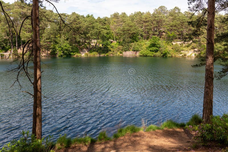 Blue pool in Dorset stock image. Image of colour, scenery - 346709737