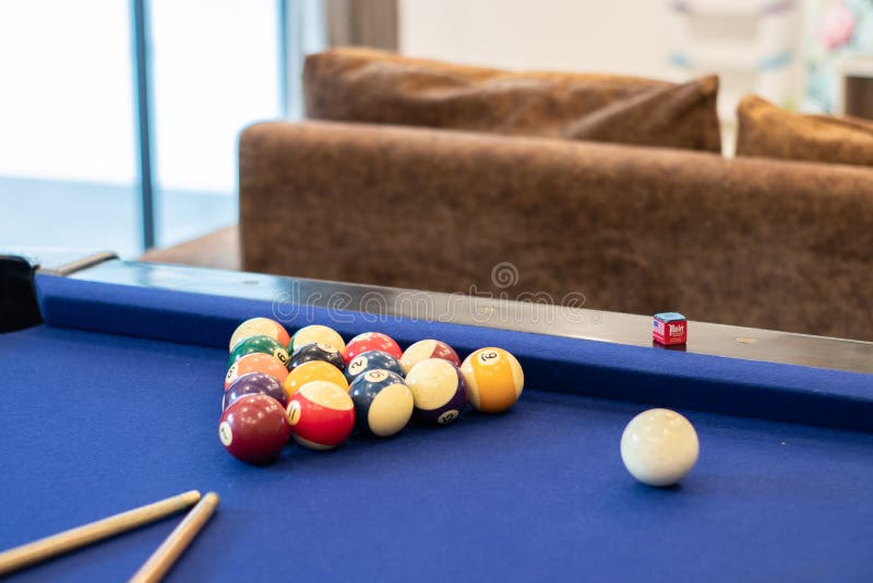 Blue Pool table with balls stock image. Image of leisure - 209460193