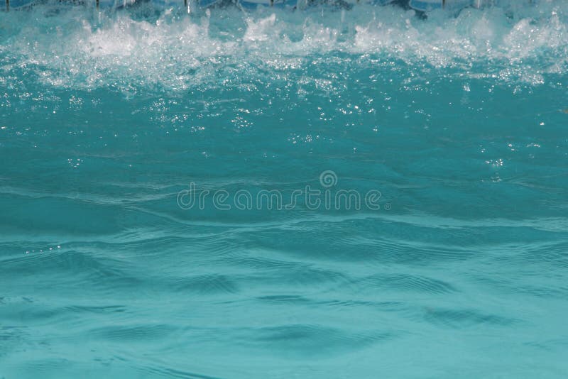Blue Pool Water Reflecting Sun Rippled Details.surface of Blue Pool ...