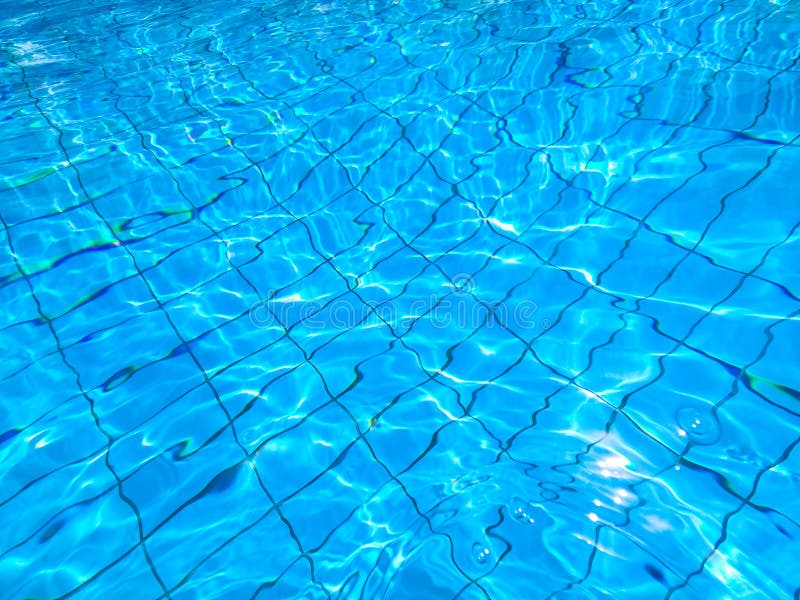 Blue Pool Water with Sun Reflections Stock Image - Image of rippled ...