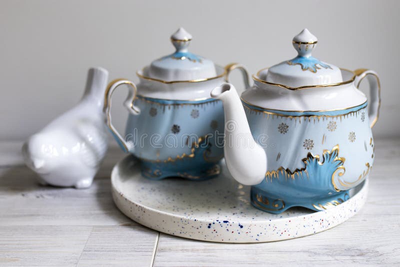 A Blue Porcelain Tea Set on the Table. Teapot and Cups of Tea Stock ...