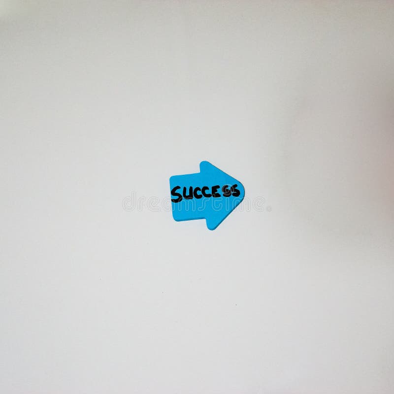 Blue Post it Arrow Shaped with Succes Writing. Writing Succes on Sticky ...