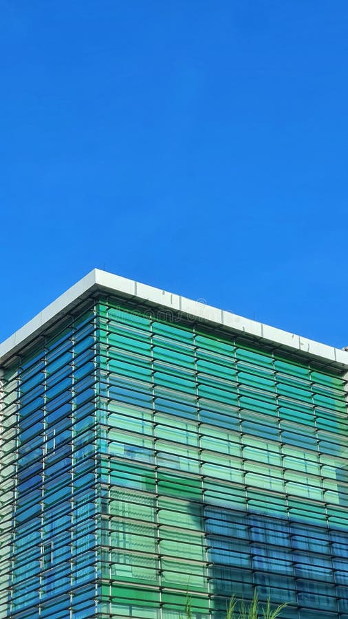 Blue Potrait Sky and the Glass Building with Awesome Architect of the ...