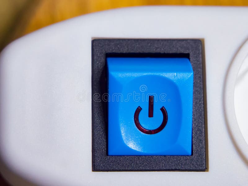 A Blue Power Button with a Power Icon, Set on a White Device ...