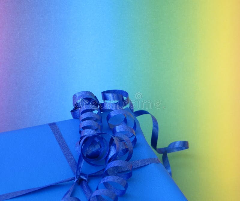 Blue Present in Front of a Blue Green Yellow Orange Red Colourful Nice ...