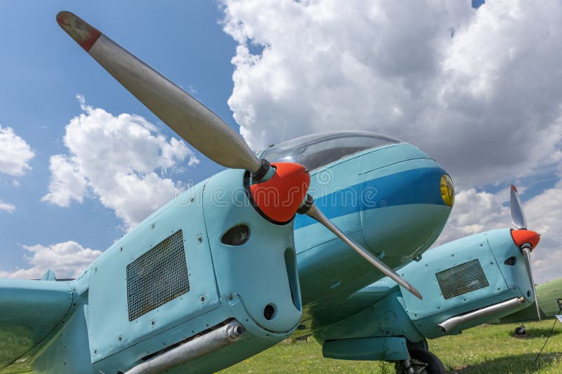 Blue Propeller Airplane Standing on a Grass Stock Photo - Image of ...