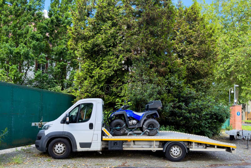 Blue Quad Bike on the Platform of a Small Car. Stock Image - Image of ...