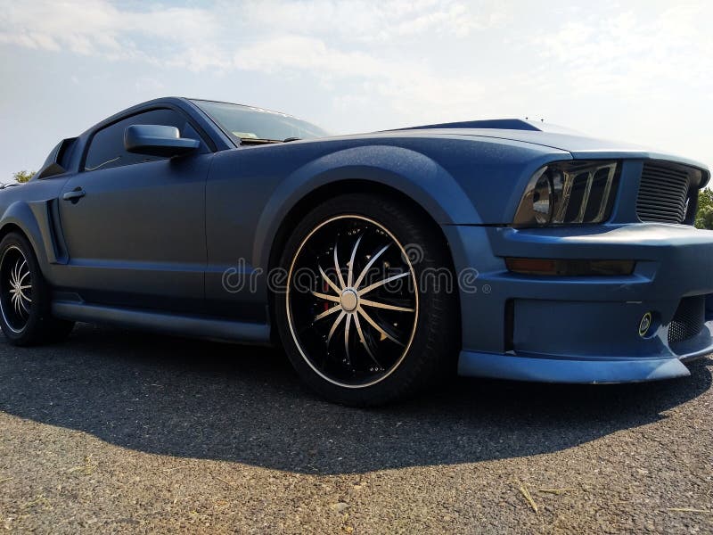 Blue Racing Car Parked Outdoors on a Sunny Day Stock Image - Image of ...