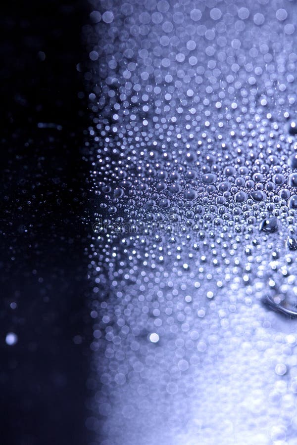 Blue Rain Bubbles Drops Running Down a Window on a Wet Day Abstract ...