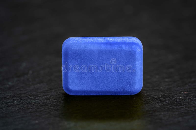 Blue Rectangular Pill on Black Background Stock Photo - Image of ...