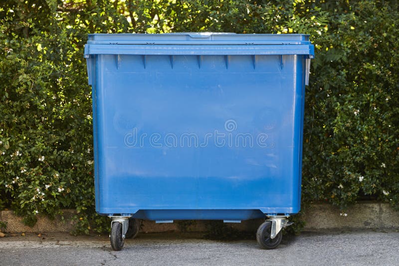 Blue Recycling Container for Paper with Cardboard Boxes. Stock Photo ...