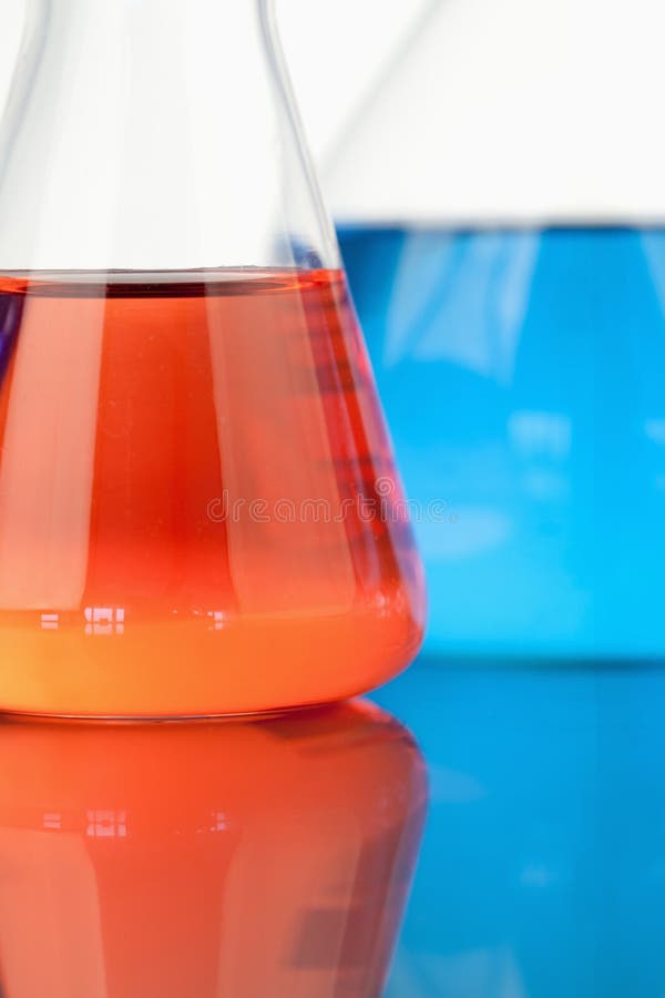 Blue and red beakers stock image. Image of instrument - 19888333