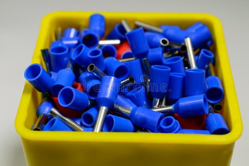 Blue and Red Ferrules in the Yellow Box - Macro Photo. Selective Focus ...