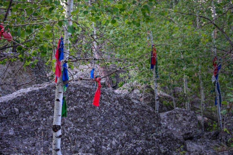 Blue and Red Prayer Flags in Trees Stock Image - Image of rocks, flags ...