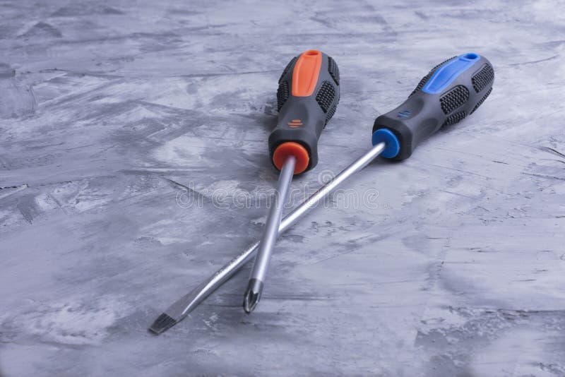 Blue and Red Screwdriver, on a Colored Background Stock Photo - Image ...