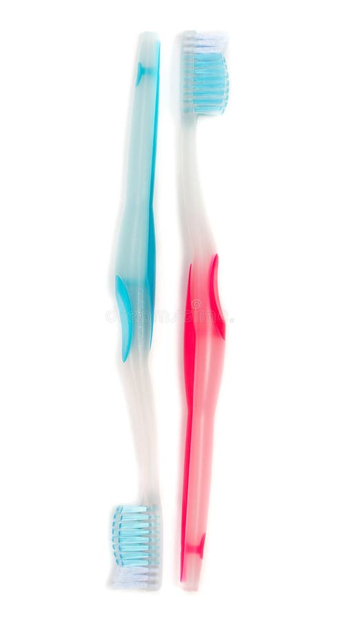 A Blue And A Red Toothbrush Isolated On White Background. Stock Photo ...