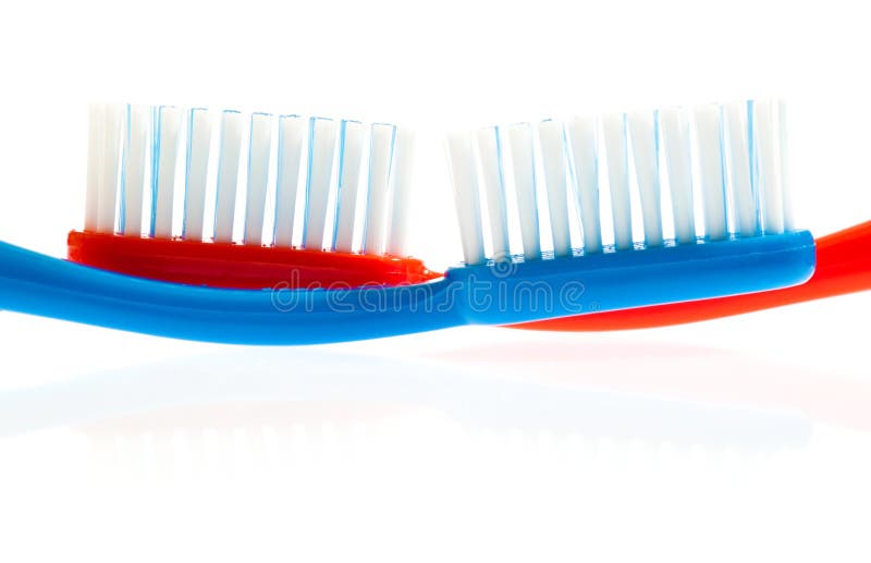 Blue and Red Toothbrushes on a White Background Stock Image - Image of ...