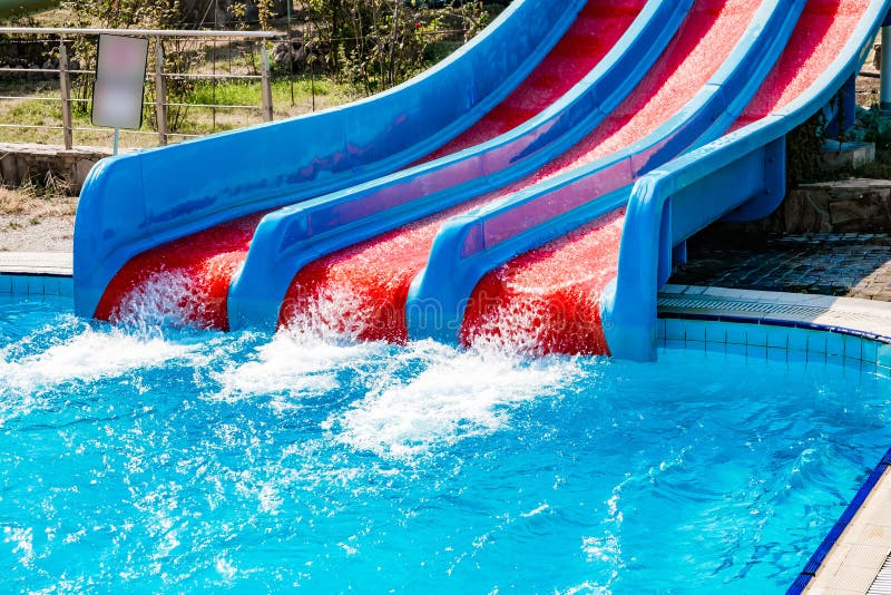 Blue and Red Waterslide at Aquapark Outdoor Pool Stock Photo - Image of ...