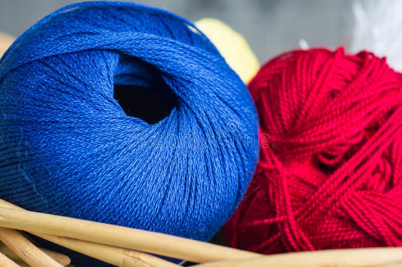 Blue and Red Yarn in a Basket Stock Photo - Image of striped, circle ...