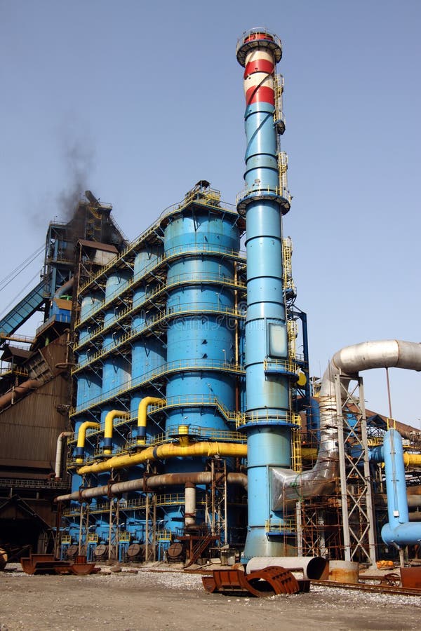 Blue Refinery and chimney stock photo. Image of liquid - 19360066