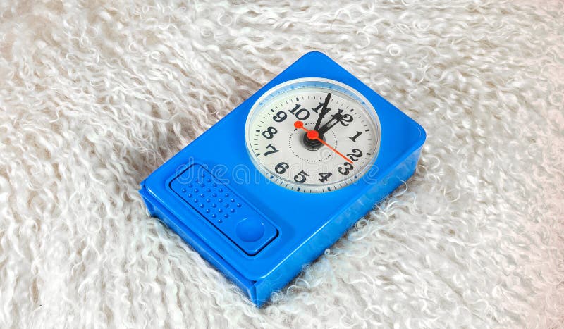 Blue Retro Clock on White Woolen Surface Stock Image - Image of alarm ...