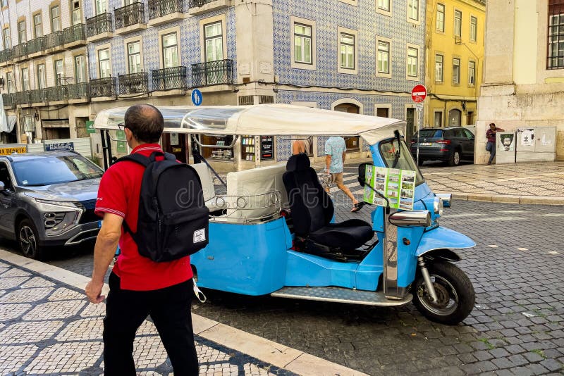 Blue Rickshaw Parked on the Road in Lisbon Editorial Photography ...