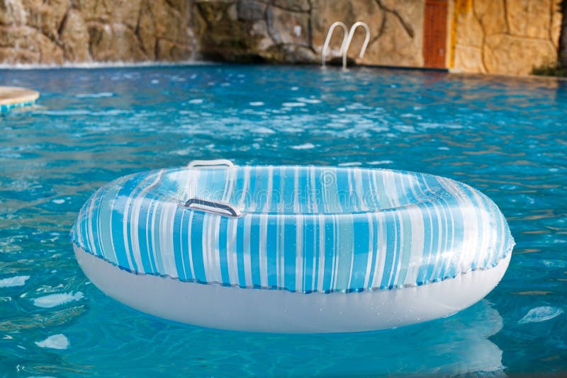Blue Ring Float in Swimming Pool Stock Photo - Image of float, children ...