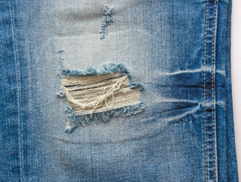 Blue ripped jeans stock photo. Image of people, emotions - 52192420