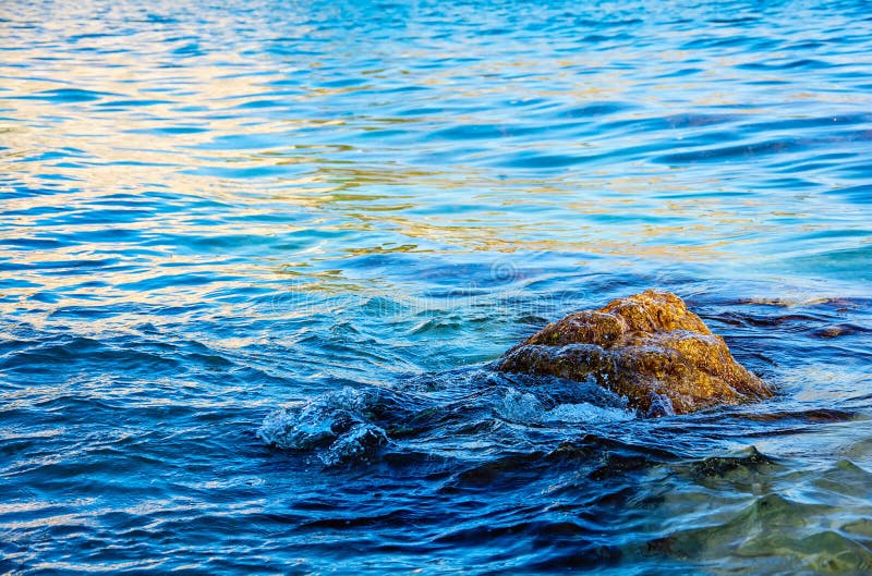 Blue Ripple Wave Sea with Rock Stock Image - Image of clear, motion ...