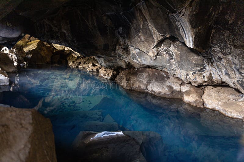Blue River Inside a Grjotagja Cave, Iceland Stock Photo - Image of ...