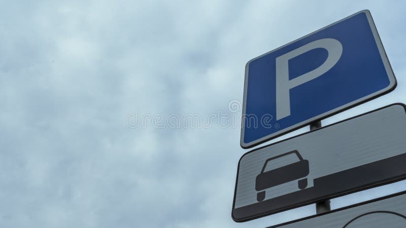 Blue Road Sign with Letter P on Rectangular Plate Isolated Against a ...